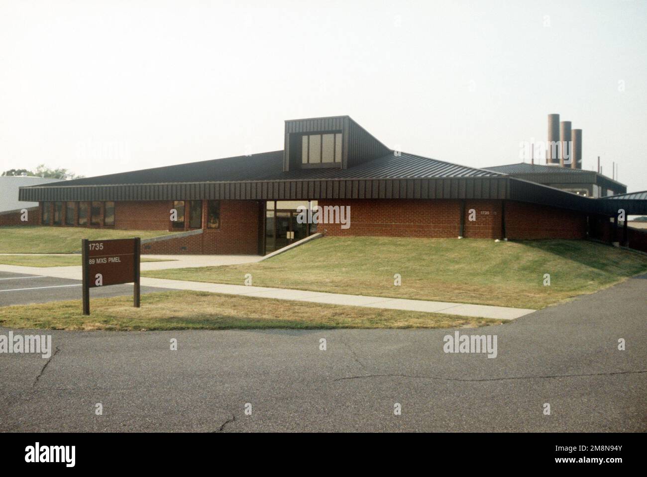 Front view of building 1735, 89th Maintenance Squadron Precision ...