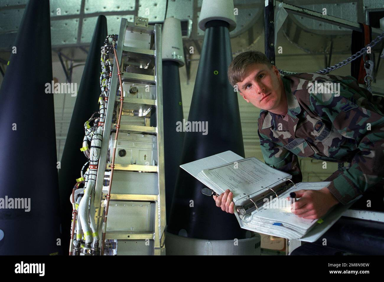 Left side front view, medium shot of USAF Airmen First Class Shane ...