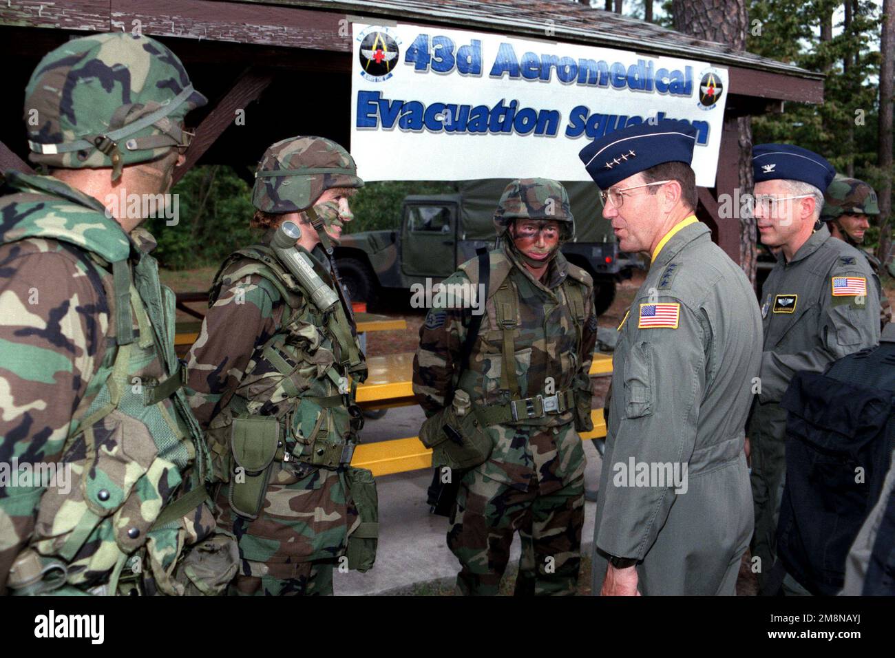 US Air Force flight nurse Captain Heidi Hoyt (second from left) from ...