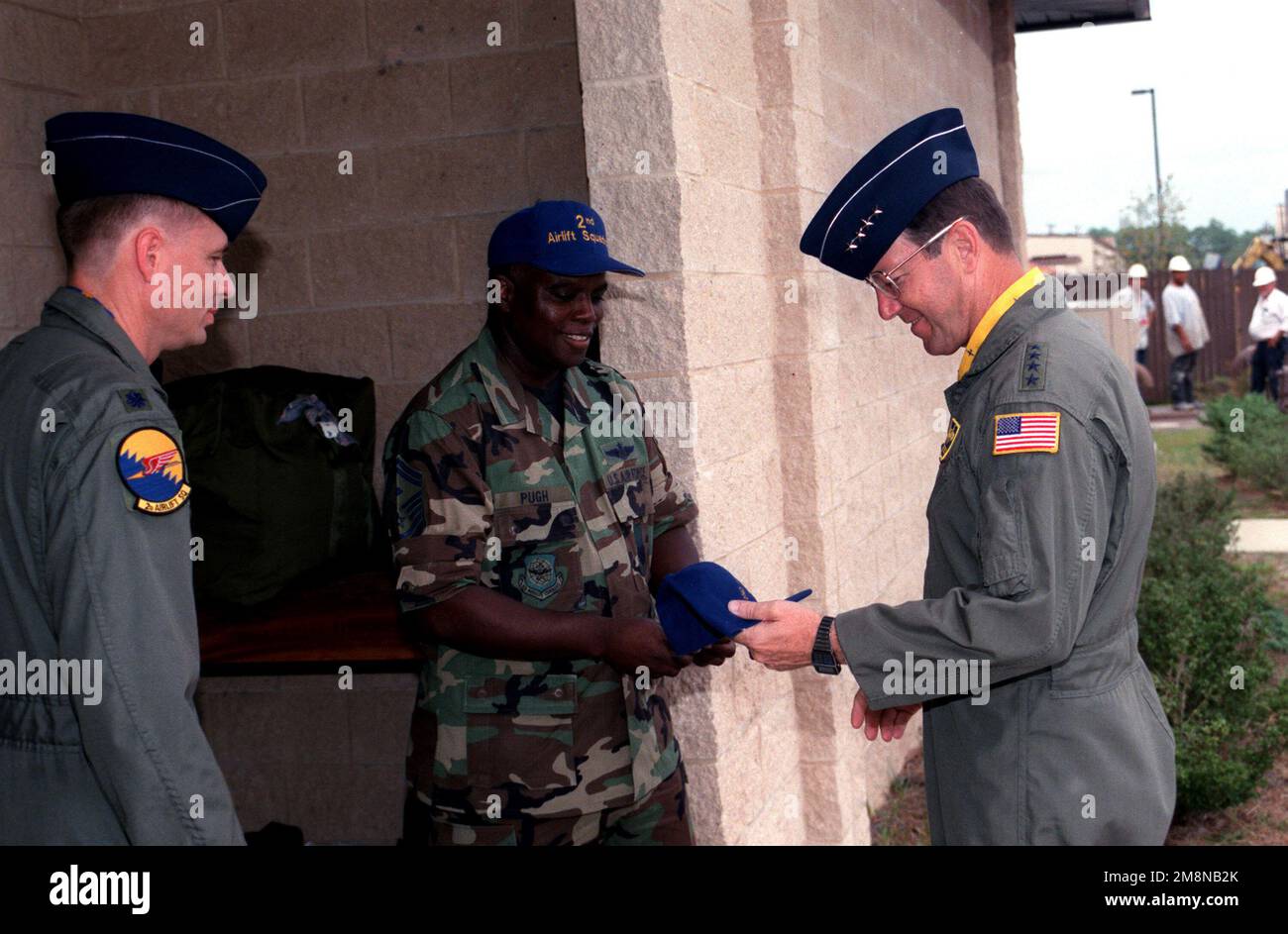 US Air Force SENIOR MASTER Sergeant Roger Pugh (center), First Sergeant ...
