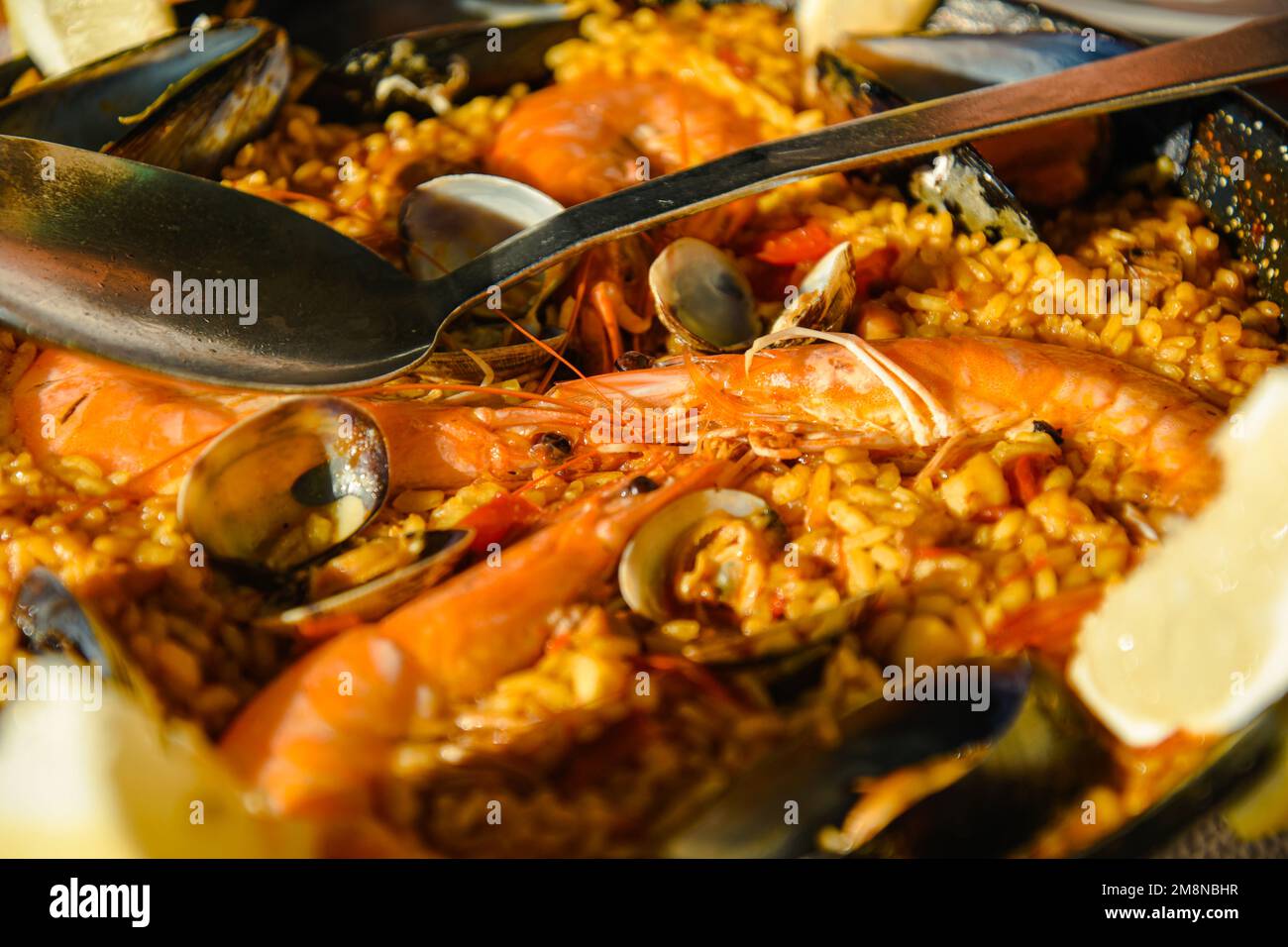 Traditional Paella served at restaurant seafood paella in the fry pan ...