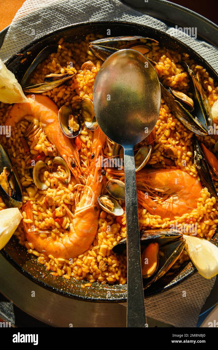 Traditional Paella served at restaurant seafood paella in the fry pan ...