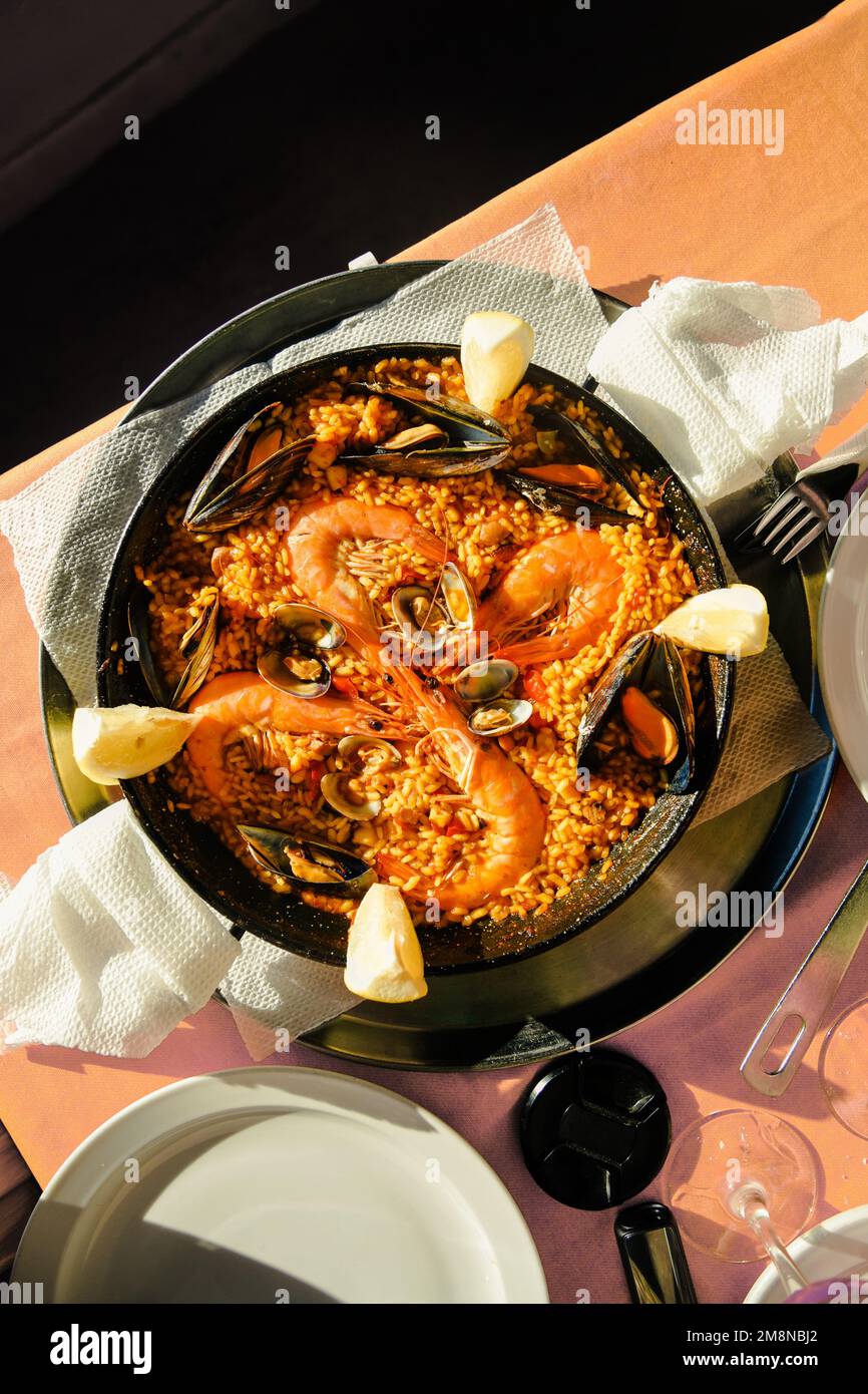 Traditional Paella served at restaurant seafood paella in the fry pan ...