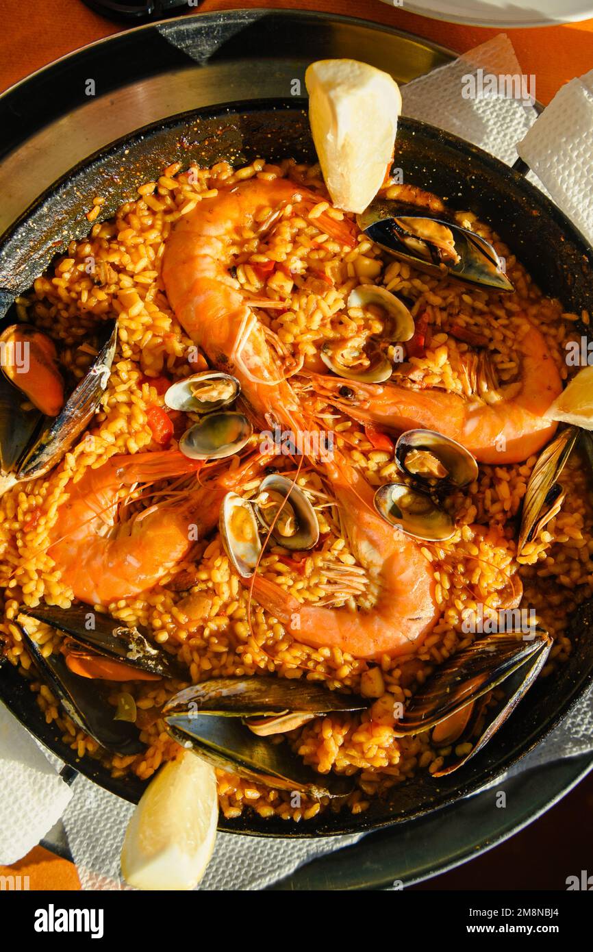 Traditional Paella served at restaurant seafood paella in the fry pan ...