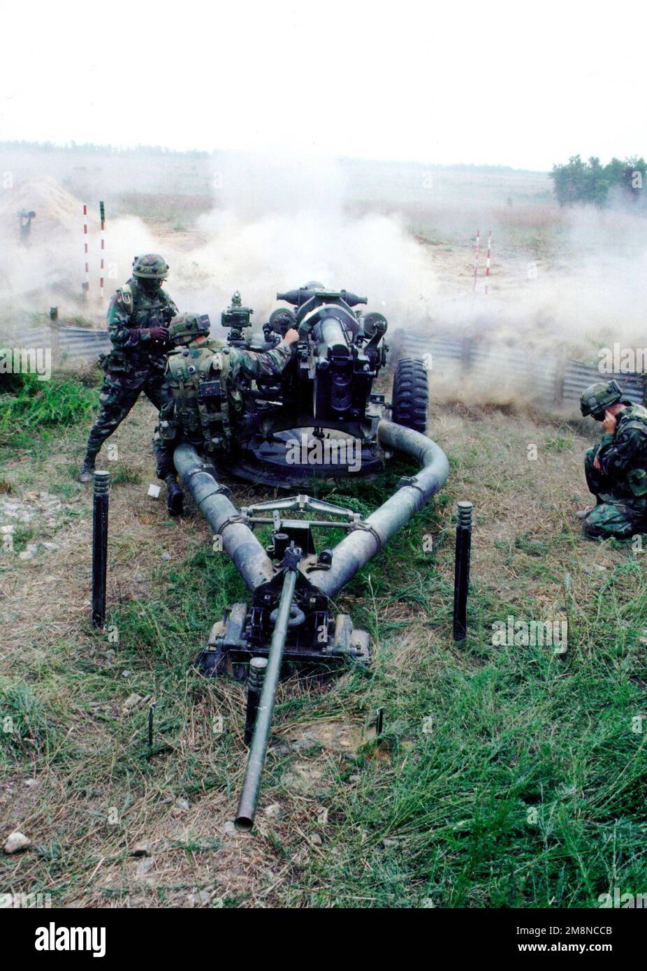 Red Legs from the 320th Field Artillery fire downrange with their 105mm ...