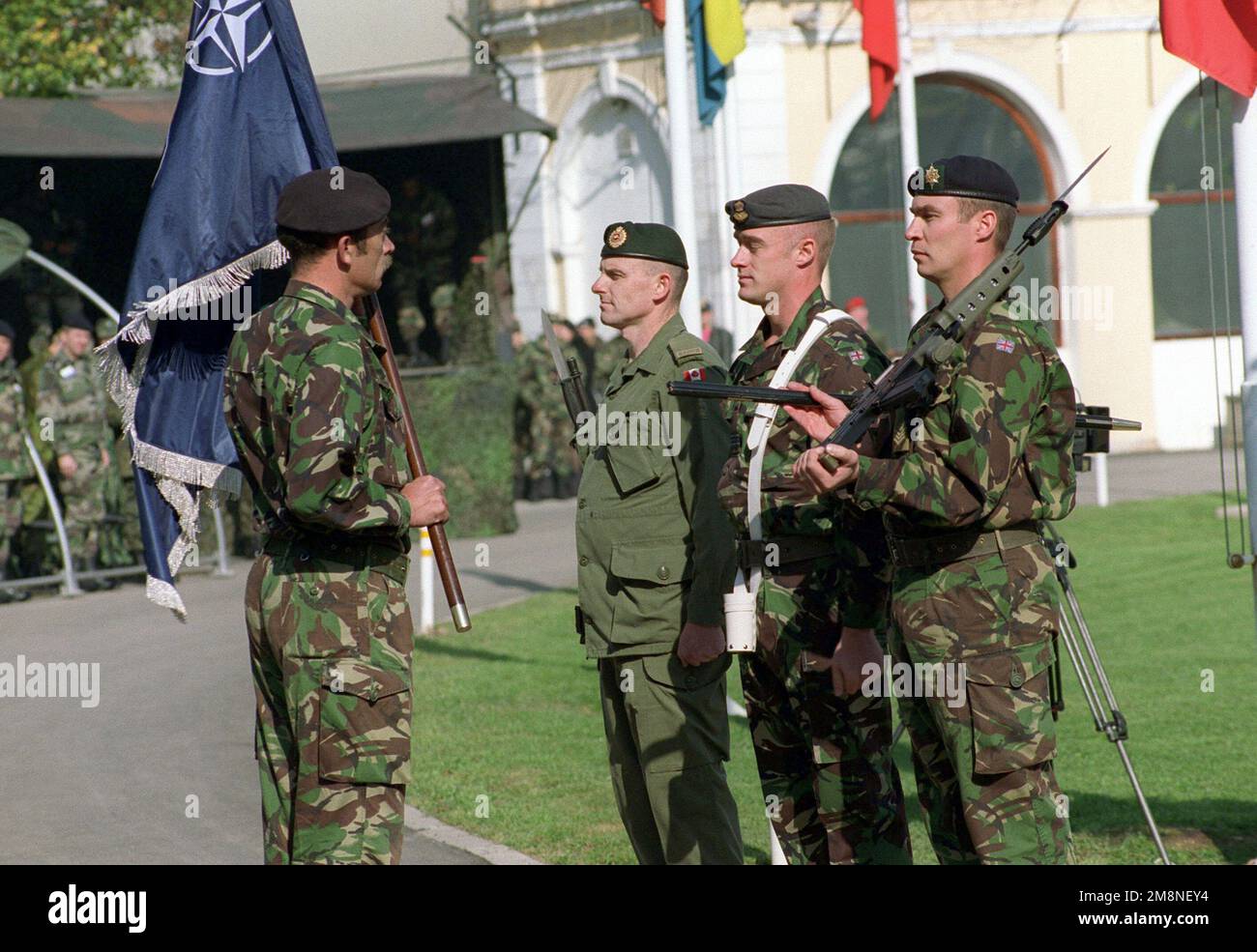 Left side front view medium shot as members of a multi-national Honor ...