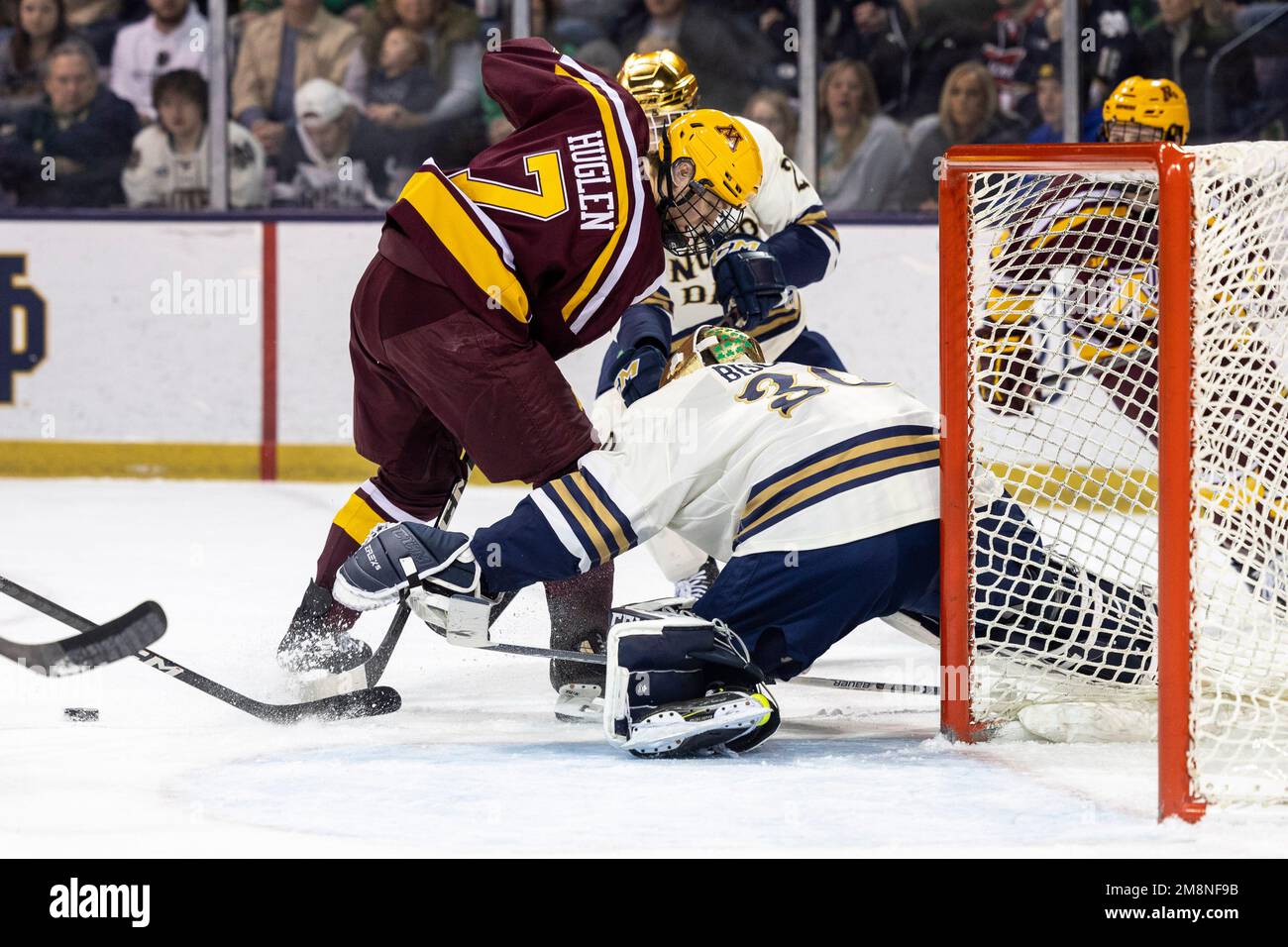 South Bend, Indiana, USA. 14th Jan, 2023. Notre Dame goaltender Ryan Bischel (30) makes the save ...