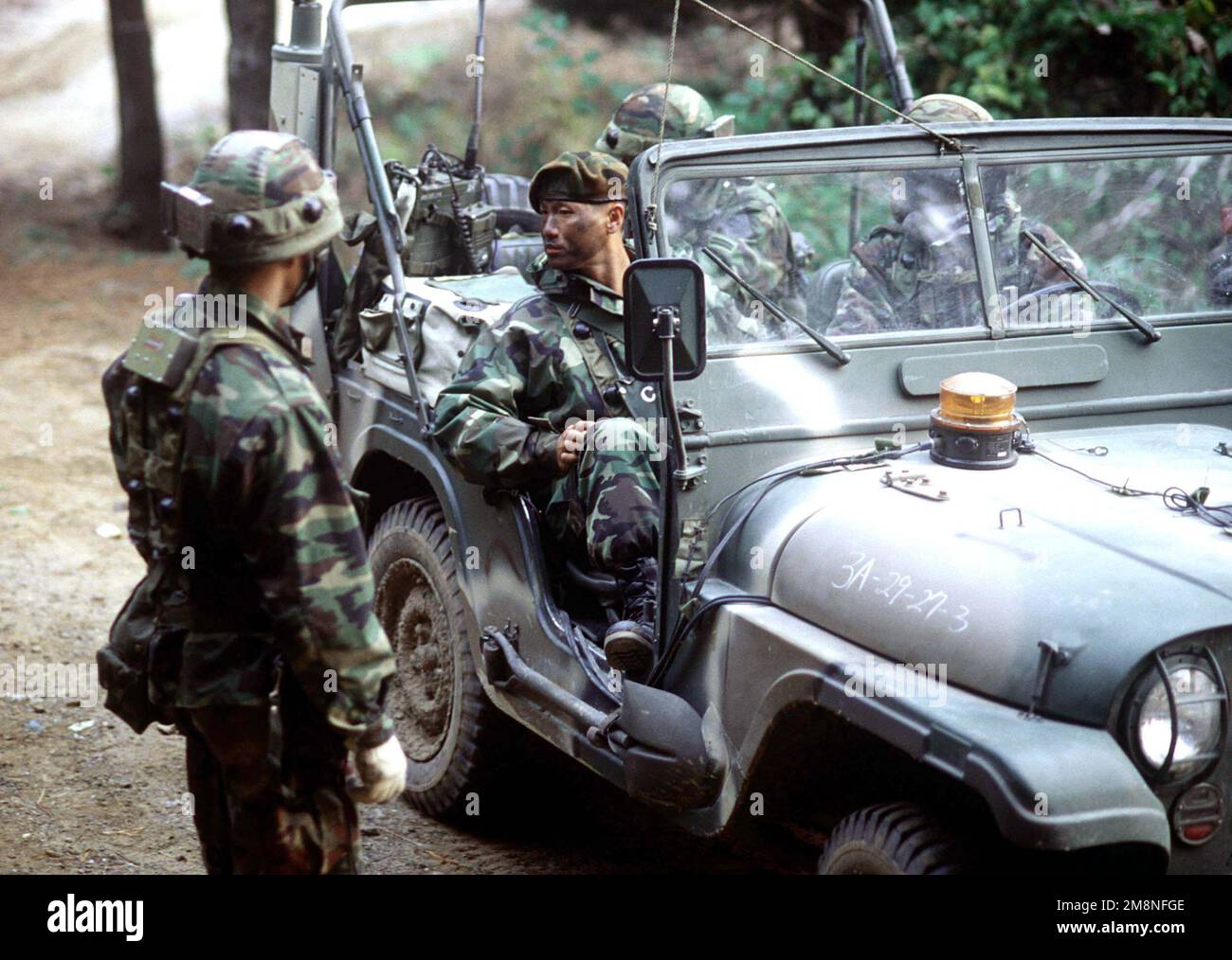 A Republic of Korea Army (ROKA) platoon leader checks on his soldiers ...