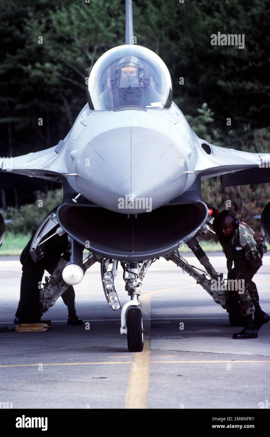 Straight on medium close-up of the nose section of a USAF F-16CJ "Wild ...