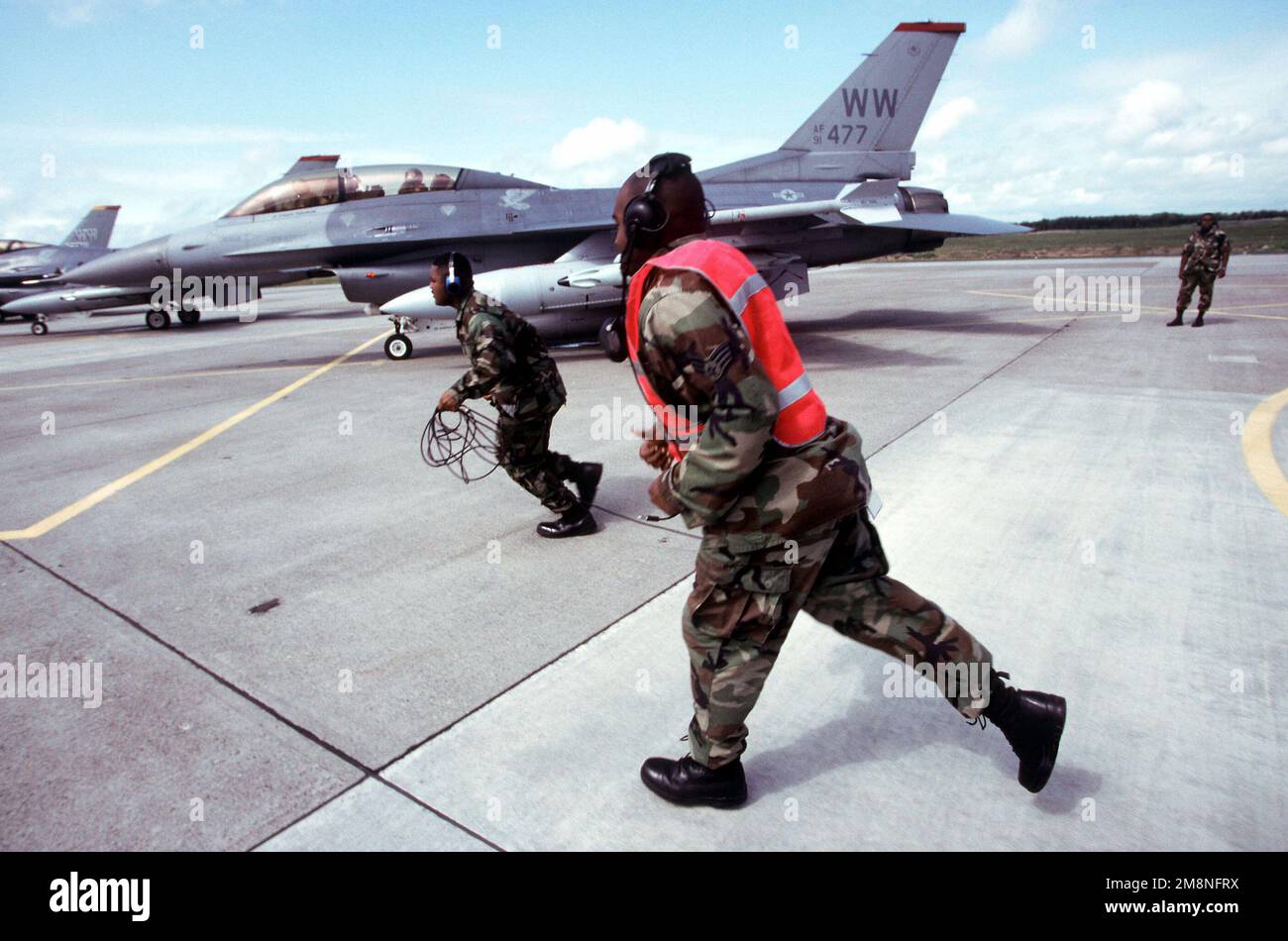 Left side profile, medium shot of USAF AIRMAN First Class Johnny Thomas ...