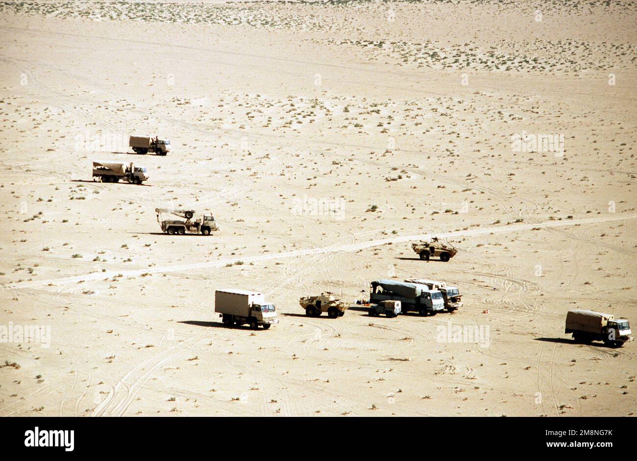 Steyr vehicles and light armored equipment are parked at an outpost ...