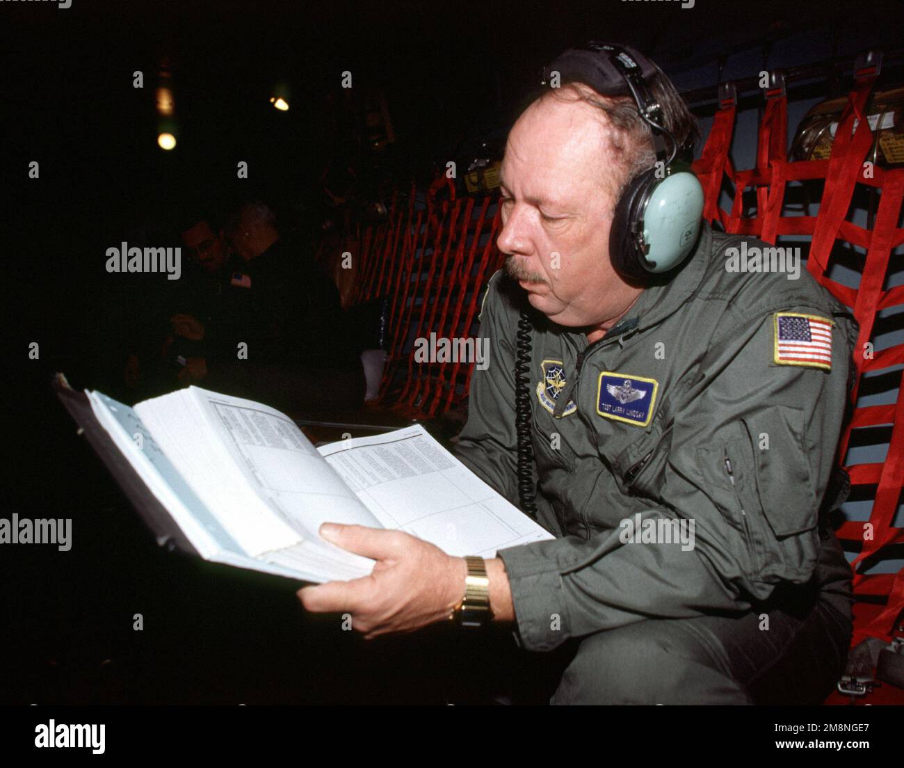 USAF Technical Sergeant Larry Lindsay, a Loadmaster assigned to the ...