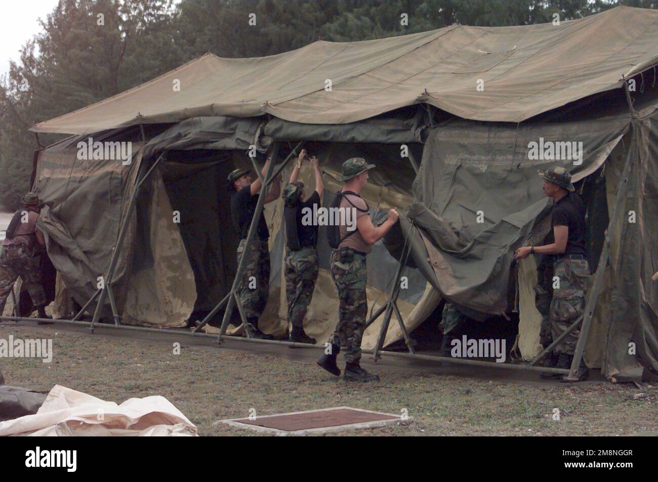 US Air Force Airmen, assigned to the 36th Civil Engineer Squadron ...