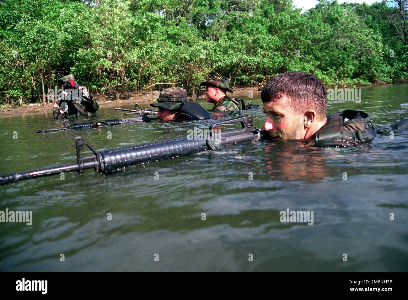 Field Radio Operator Corporal (CPL) Anthony Apostolos (background ...
