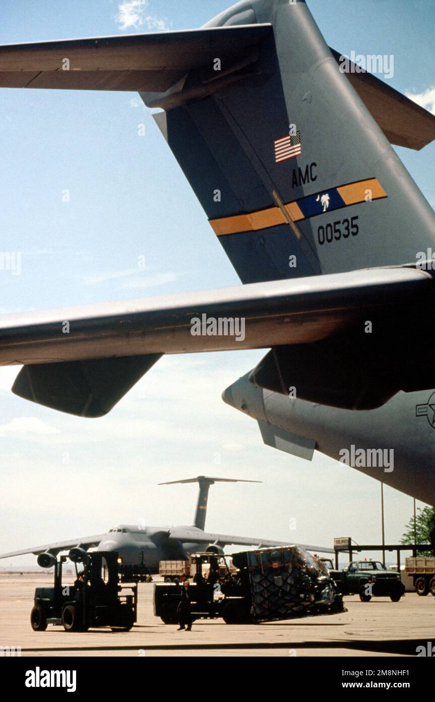 Long shot view of cargo loading in support of operations in Southwest ...