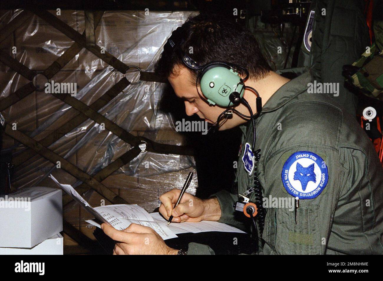 Technical Sergeant Brian Duncan, a C-130H loadmaster for the 169th Operations Support Flight ...