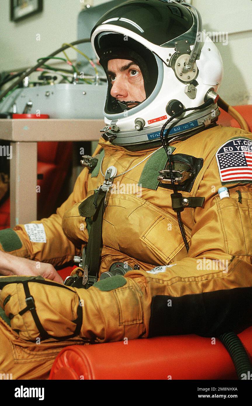 LT. COL. Raymond E. Yeilding, pilot, sits in his flight suit prior to ...