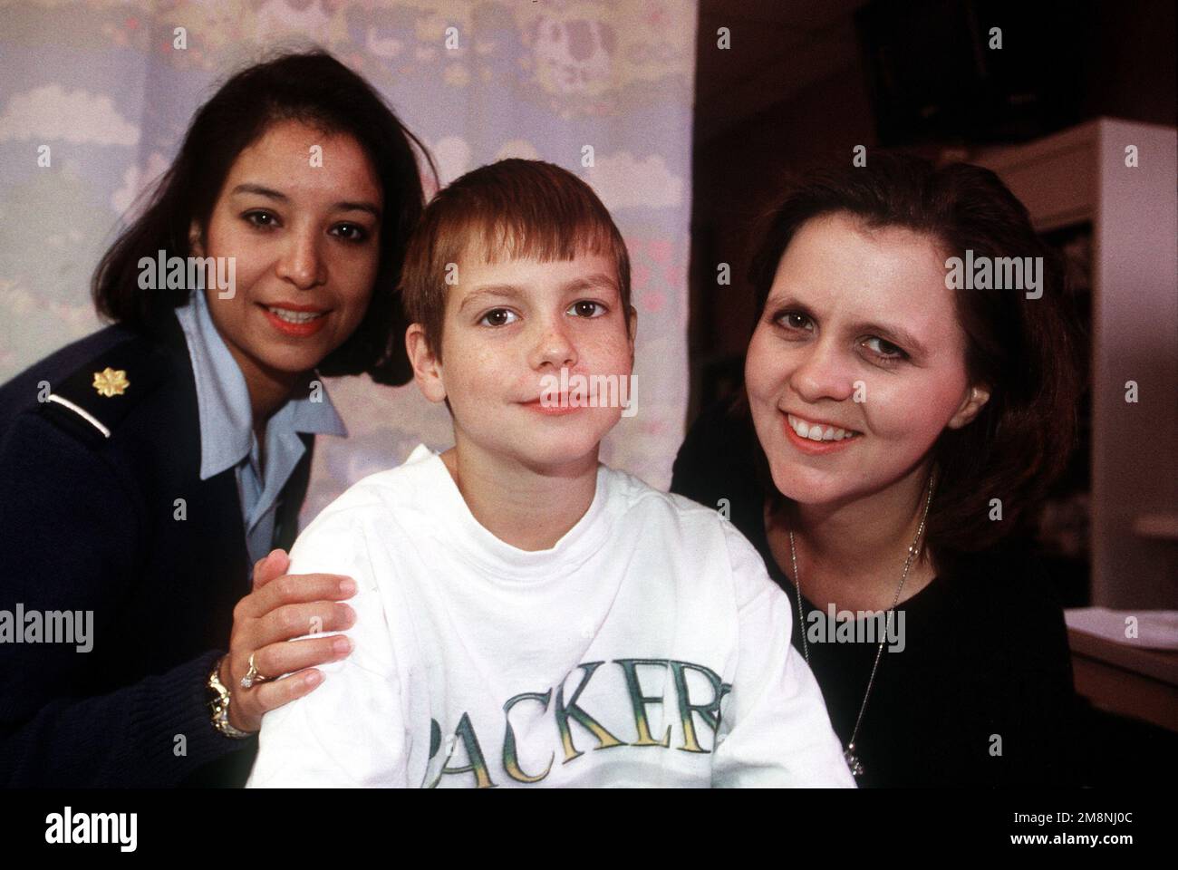 Straight on medium close-up, from left to right, of Lora Neubeck ...