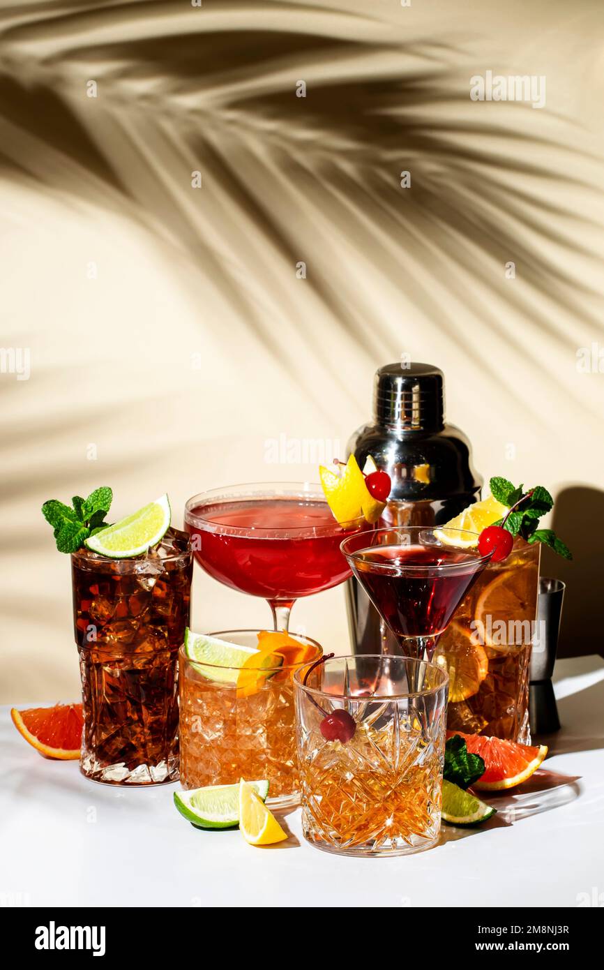 Summer alcoholic cocktails: rum cola, long island ice tea, manhattan ...