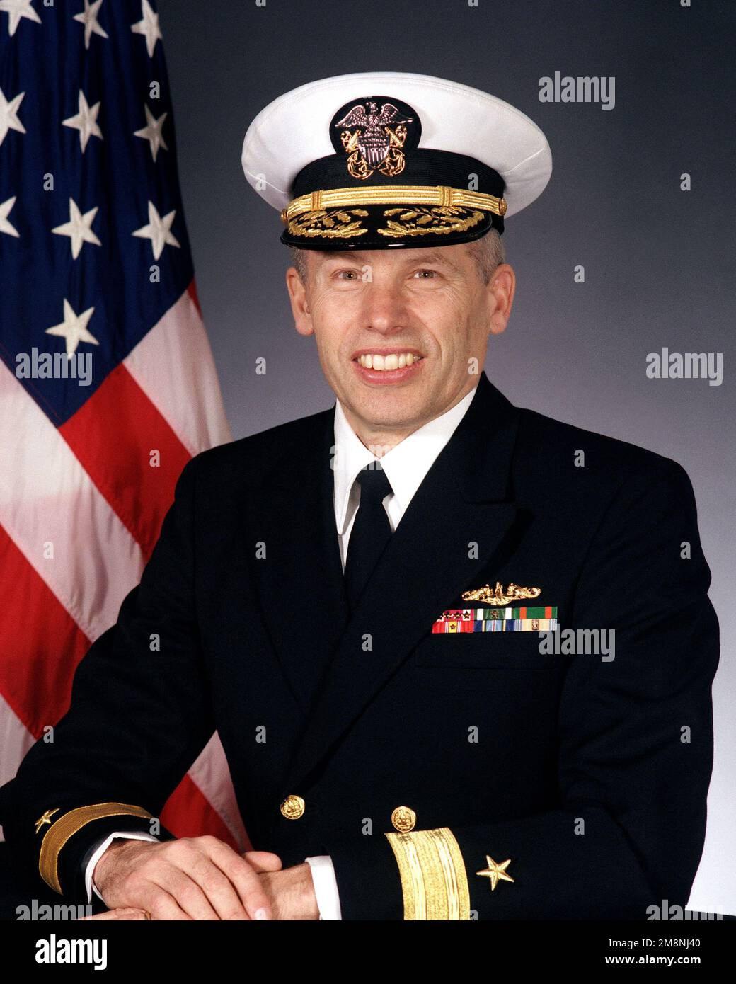 Rear Admiral (lower half) Mark R. Feichtinger, USN (covered). Country ...