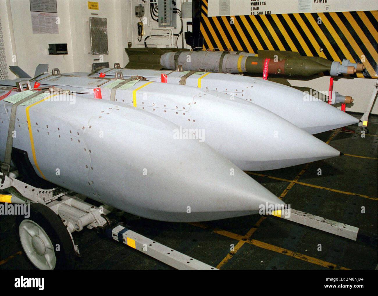 Three AGM-154 Joint Standoff Weapons (JSOW) are staged in one of many ...