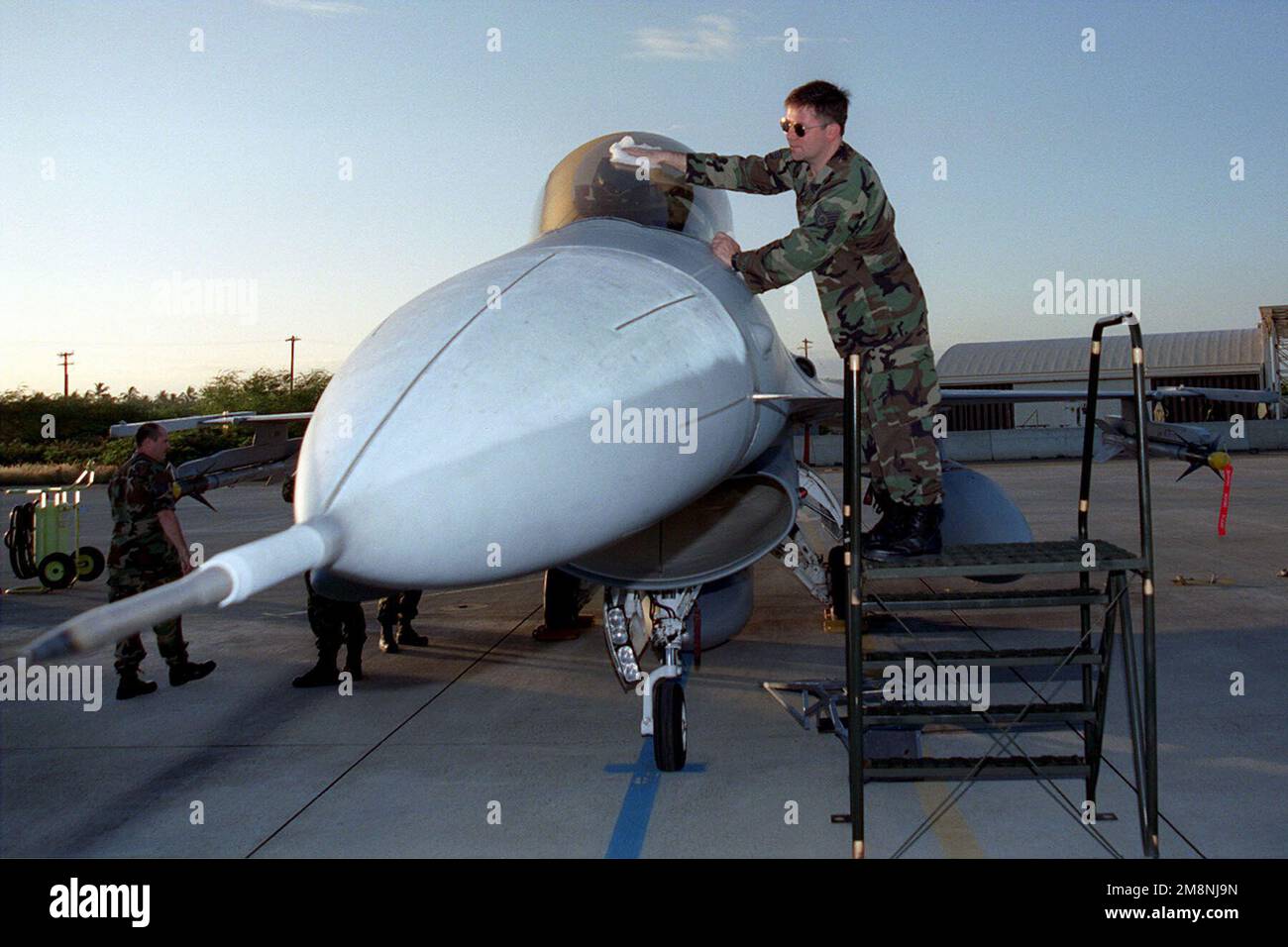STAFF Sergeant Dan Weathersby prepares an F-16C aircraft from the South ...