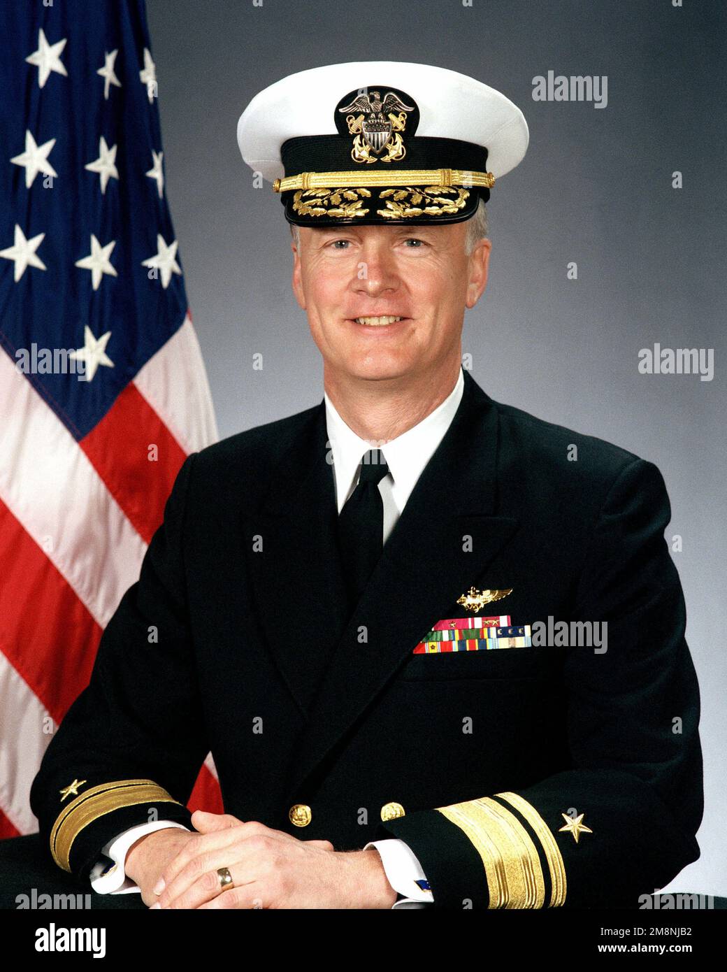 Rear Admiral (upper half) John B. Totushek, USN (covered). Country ...