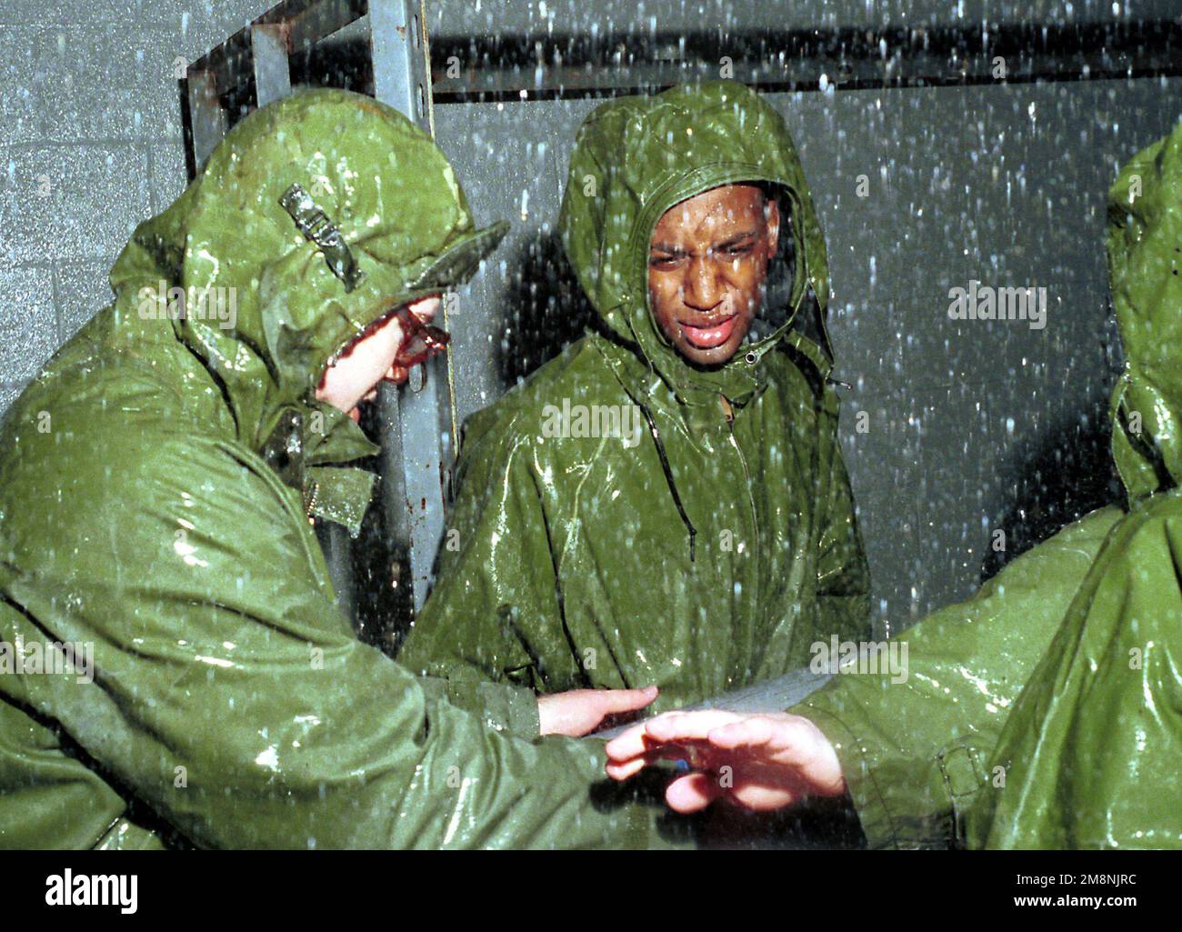 Recruits from Division 109 pass containers for 3" rounds through a ...