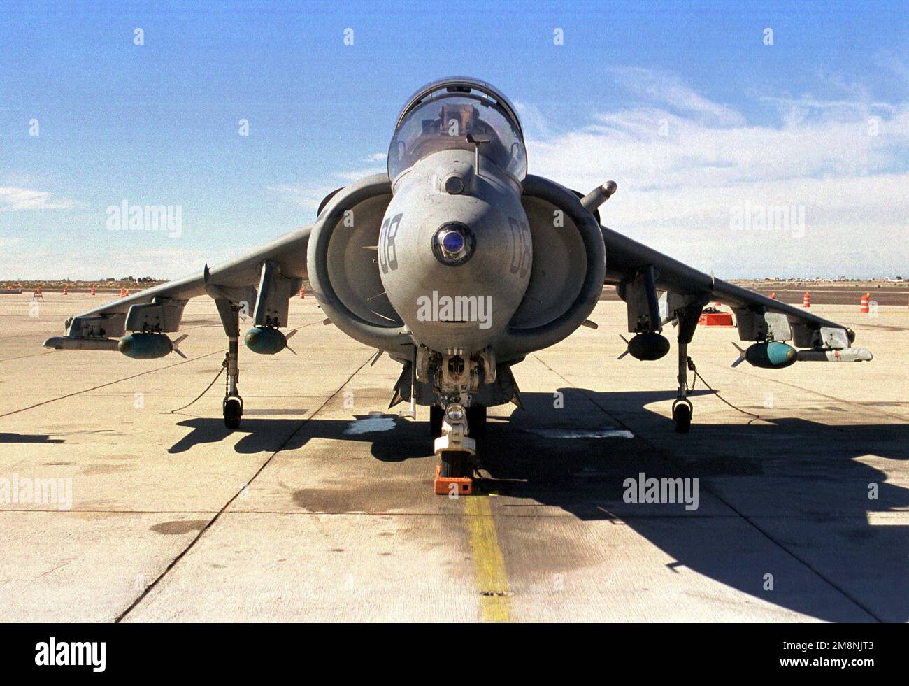 A Marine AV-8B Harrier II from Fixed Wing Attack Squadron 513, loaded ...