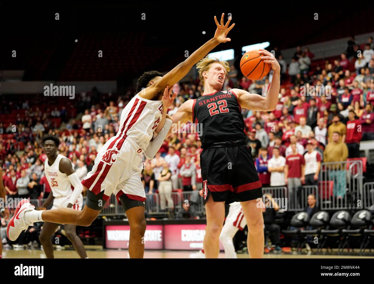 Stanford forward James Keefe (22) controls a rebound contested by ...