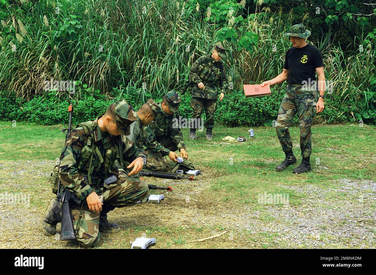 Jungle Warfare Training Center (JWTC) instructor, SGT Walls (right ...