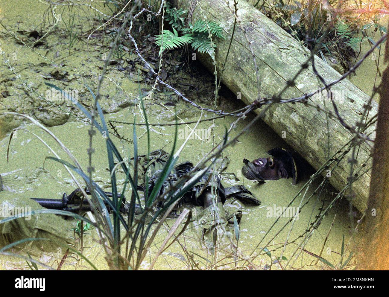 LCPL Werland a First Stinger Battery team 7 member, works his way under ...