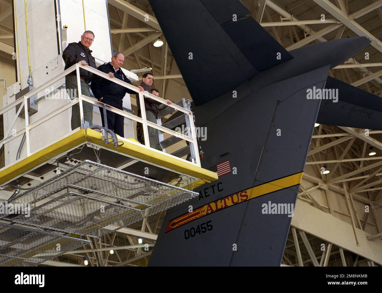 Right side front view from a low angle up to a long shot of USAF CHIEF ...