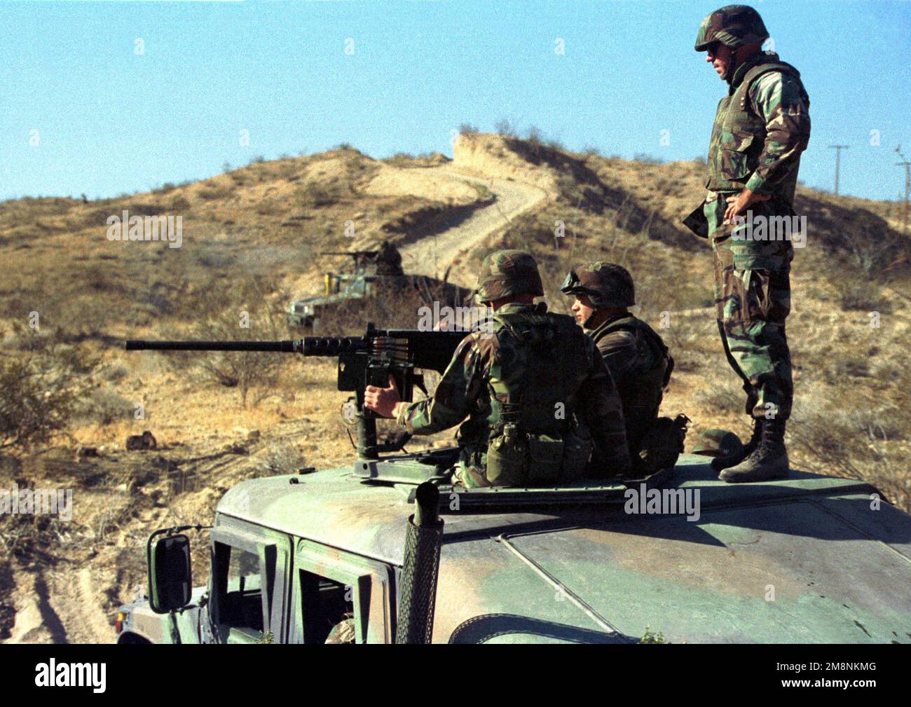 Marines from the Wing Support Squadron 371 (MWSS-371) fire their M2, 50 ...