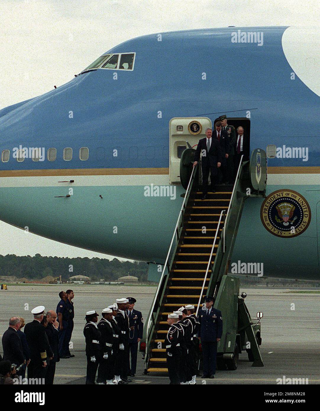 President Clinton arrives at Norfolk Naval Base on Air Force One amid ...