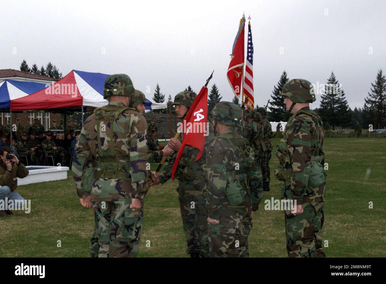 The unit flag is passed during Change of Command Ceremony and ...