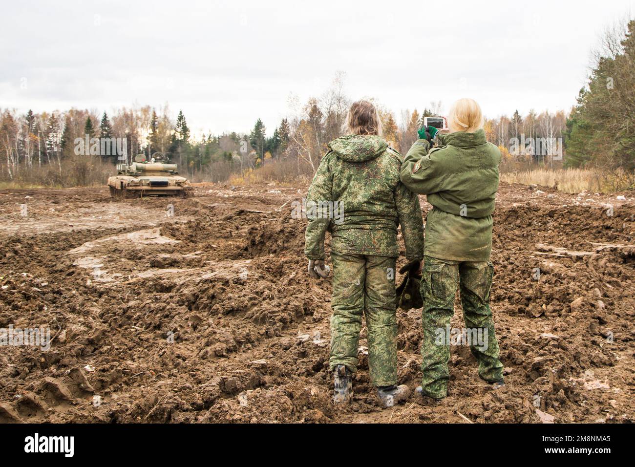 Russian tank rides on a forest road Stock Photo - Alamy