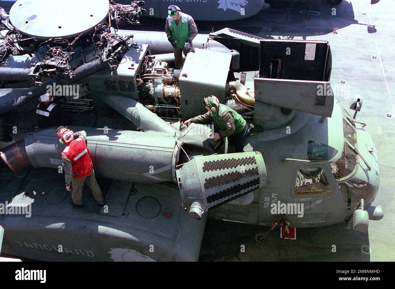 Onboard USS INCHON (MCS 12), Helicopter Squadron HM-15 maintenance team ...