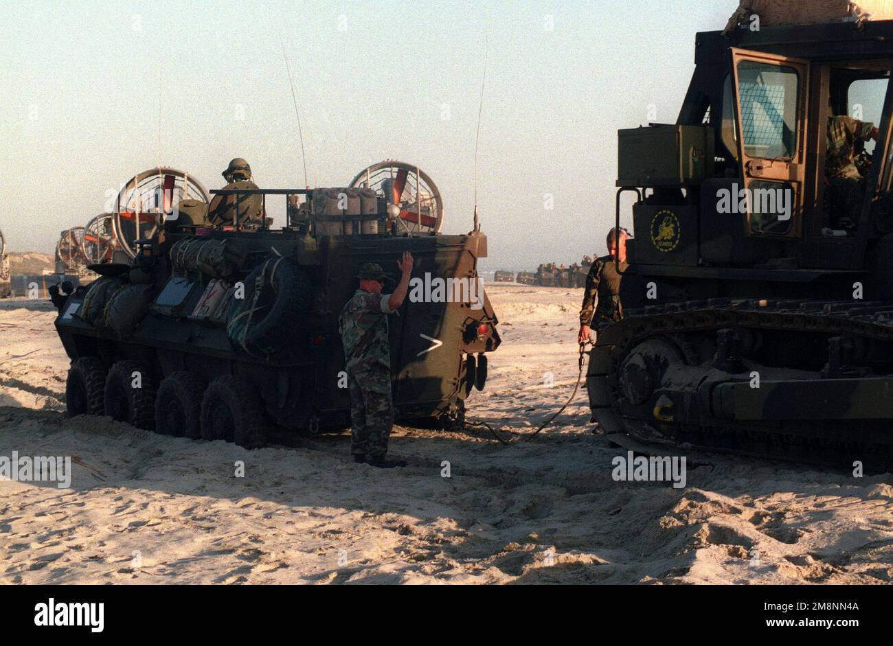 990422-M-2889C-014. [Complete] Scene Caption: Members from the Combat ...