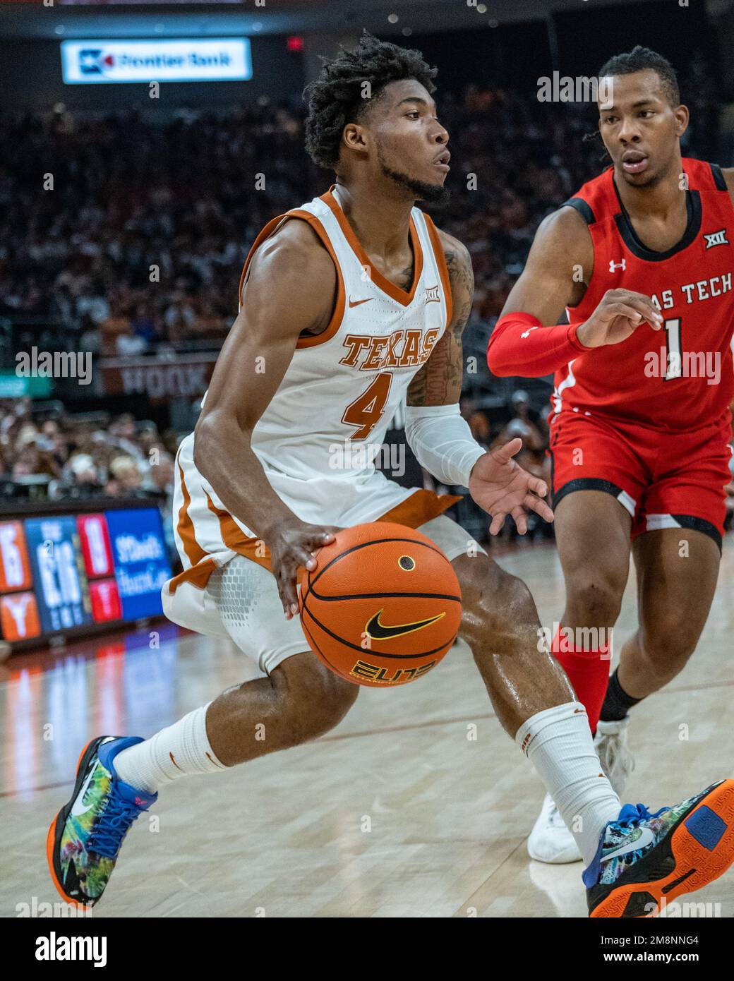 Texas, USA. 11th Jan, 2023. Tyrese Hunter #4 of the Texas Longhorns in ...