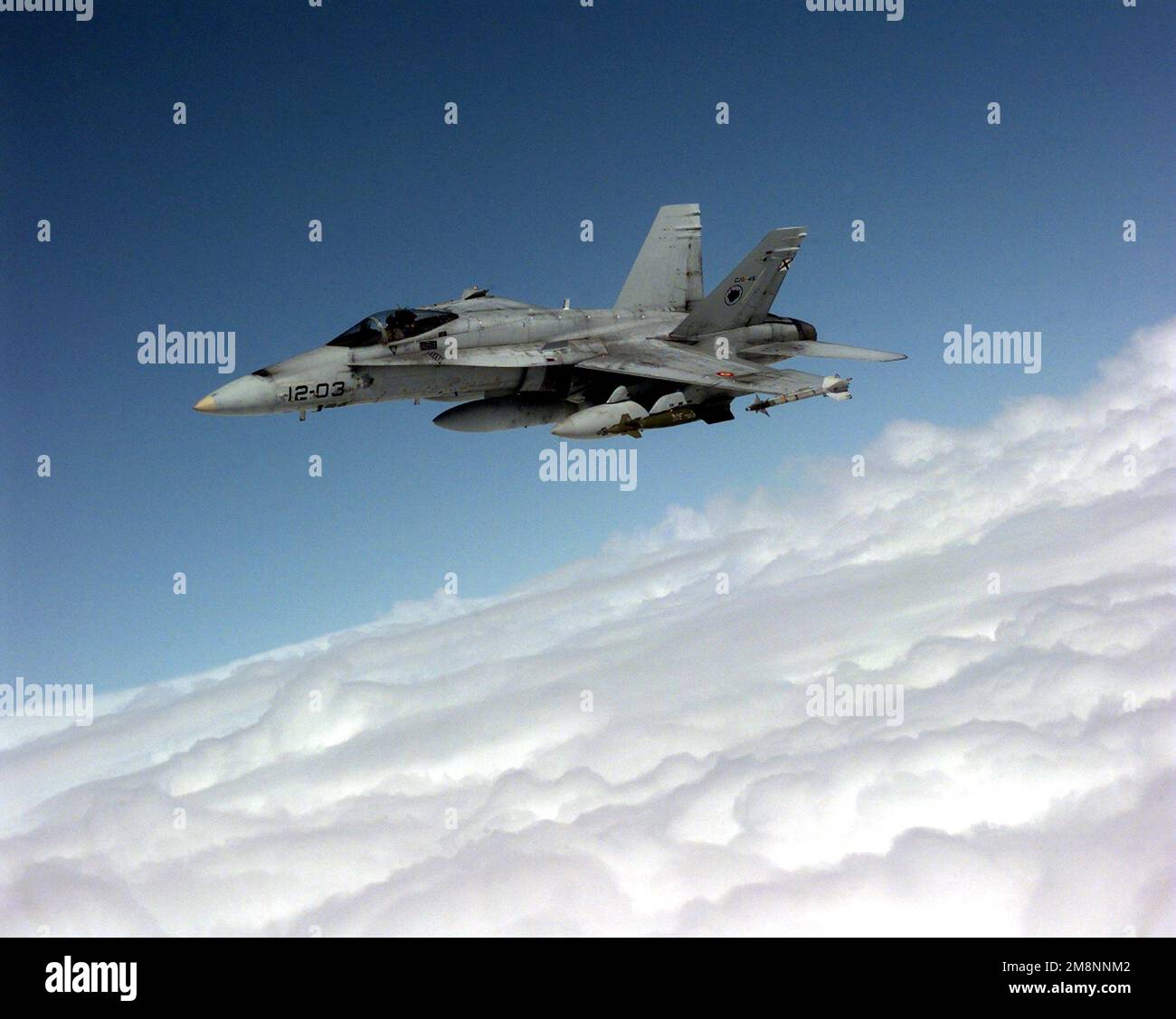 A Spanish Air Force EF-18A Hornet moves into position behind an Air ...