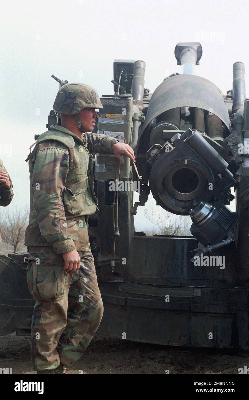 A marine from Bravo Battery, 1ST Battalion, 12th Marines, 3rd Marine ...