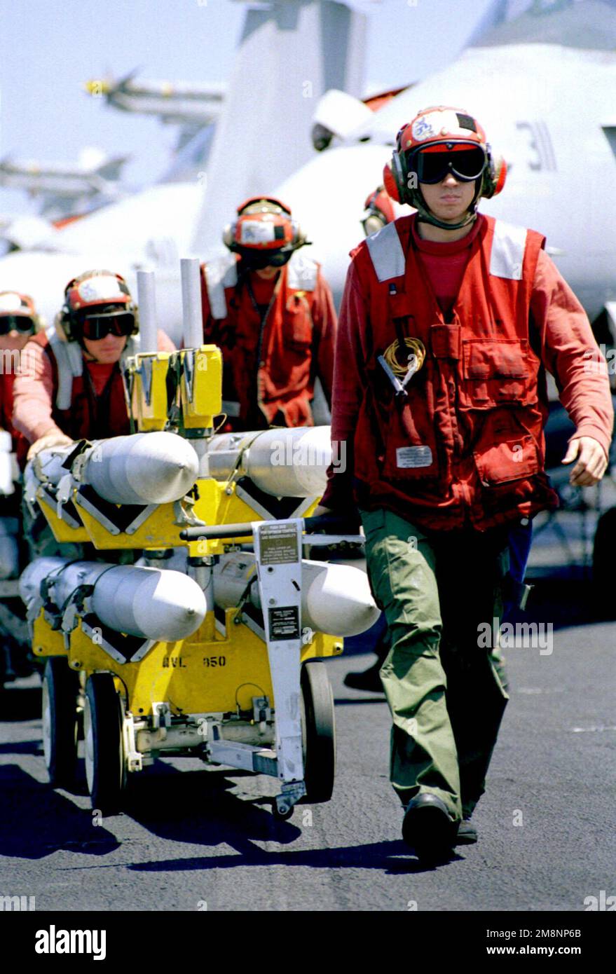 On board USS THEODORE ROOSEVELT (CVN 71), Aviation Ordnancemen from the ...