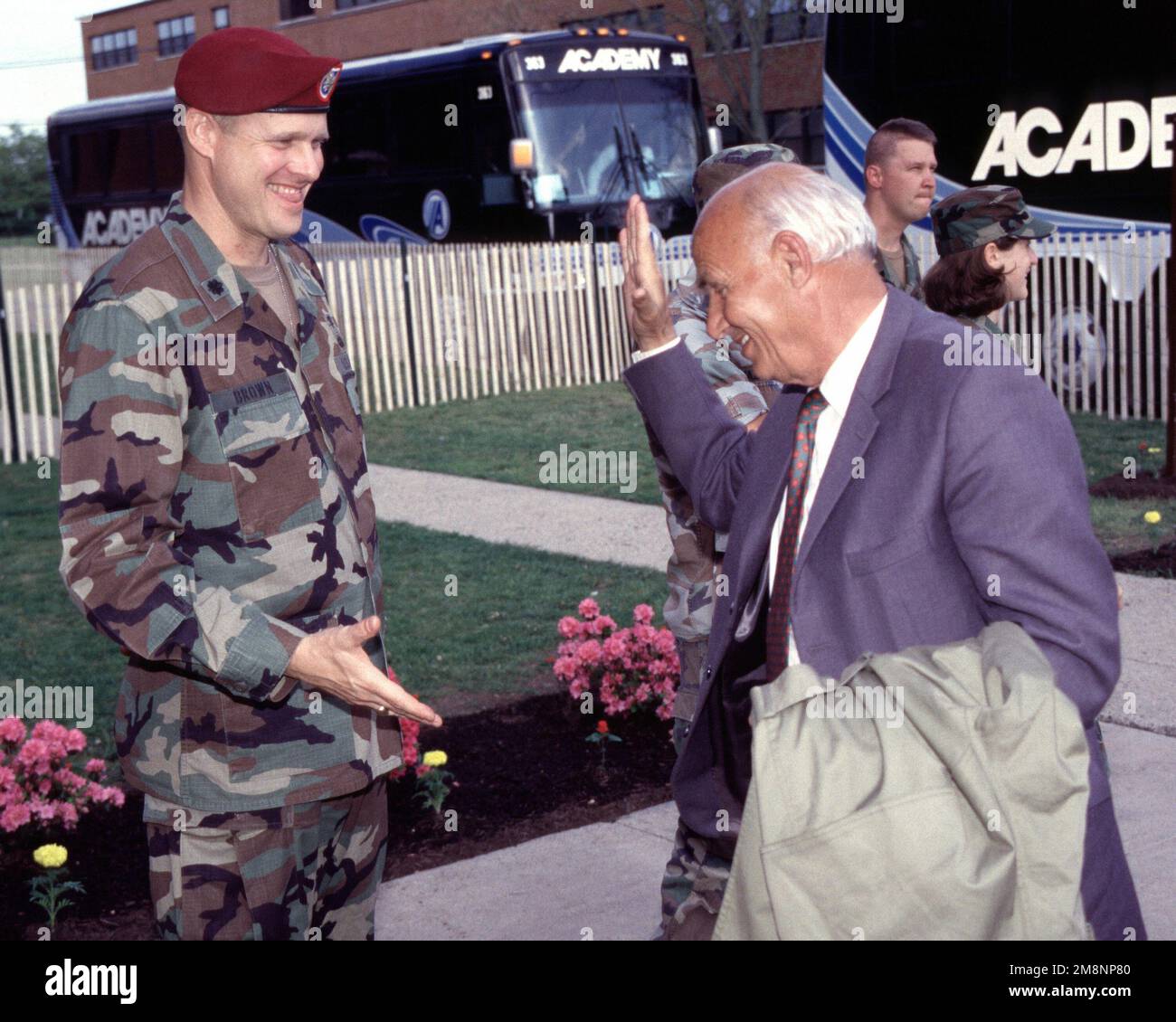 A Kosovo refugee is greeted by LTC Brown, U.S. Army, at Fort Dix, New ...