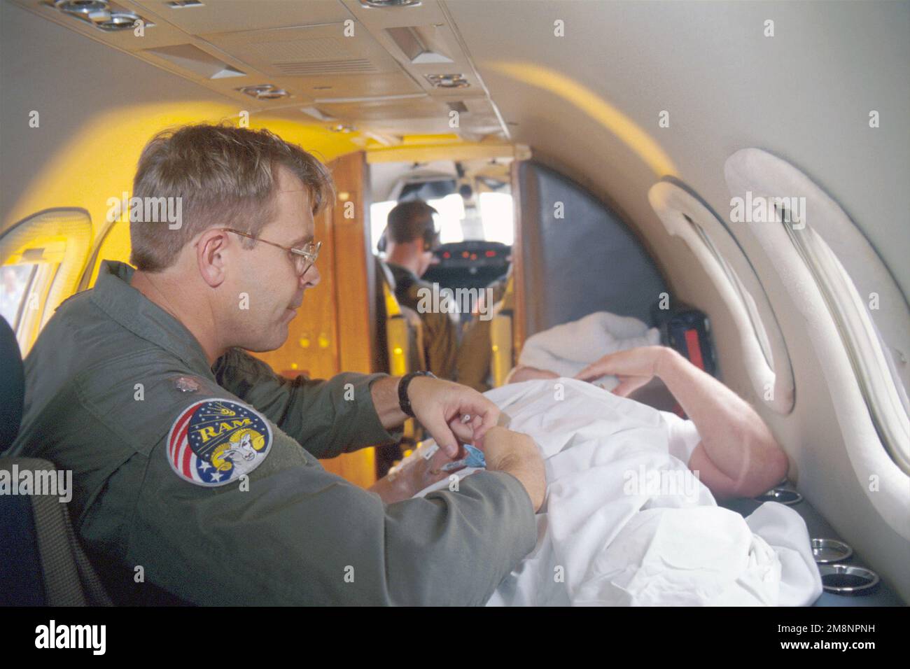 Lieutenant Colonel (Dr.) Tim Ladner injects Sergeant 1ST Class Michael ...