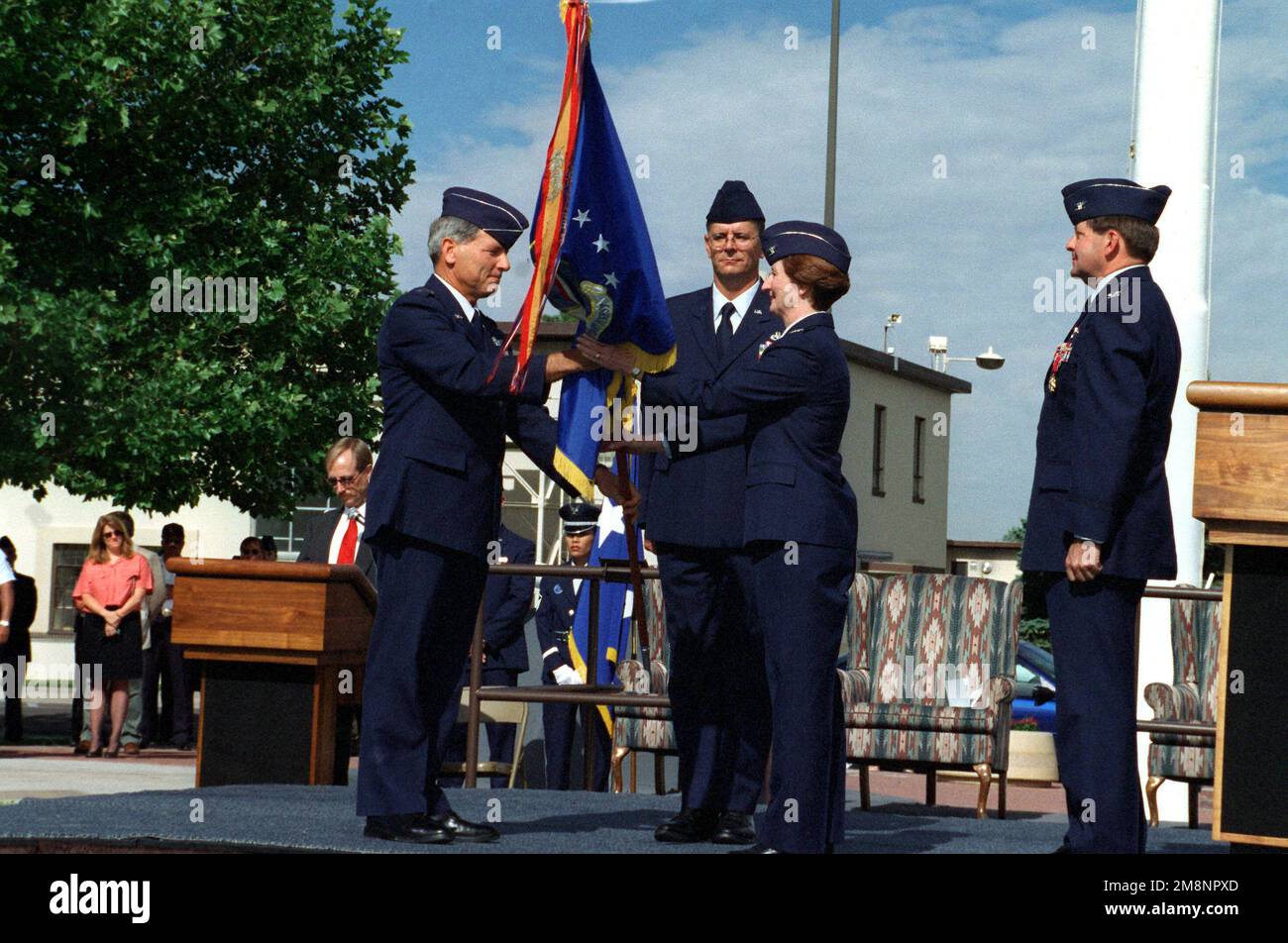 USAF Colonel Polly Peyer (2nd from right) assumes command of the 377th ...
