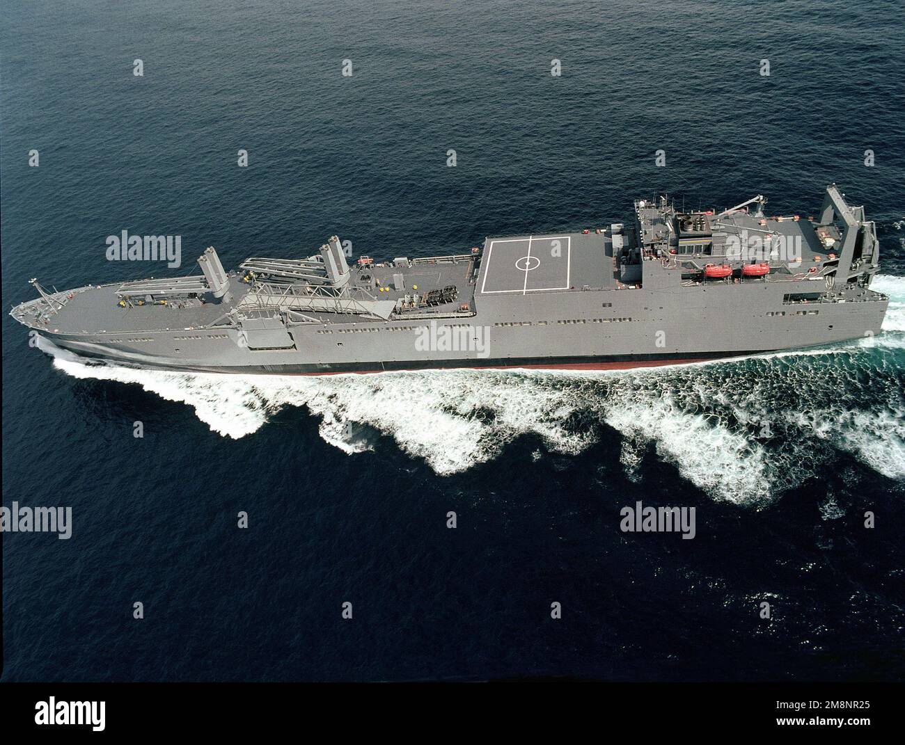 High oblique port side view of the Military Sealift Command (MSC) strategic heavy lift ship USNS ...