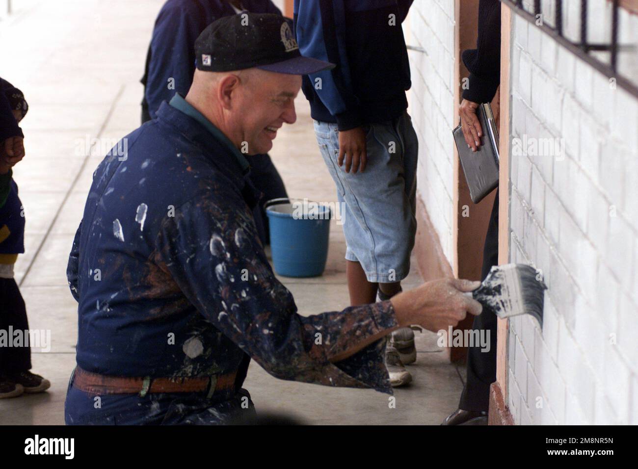 US Navy PETTY Officer Second Class James Heideman lends a helping hand ...