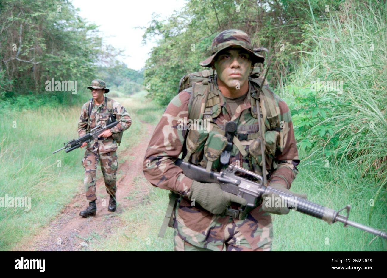 Private First Class Valdez (Foreground) from Echo 2/8, 1ST platoon, 1ST ...