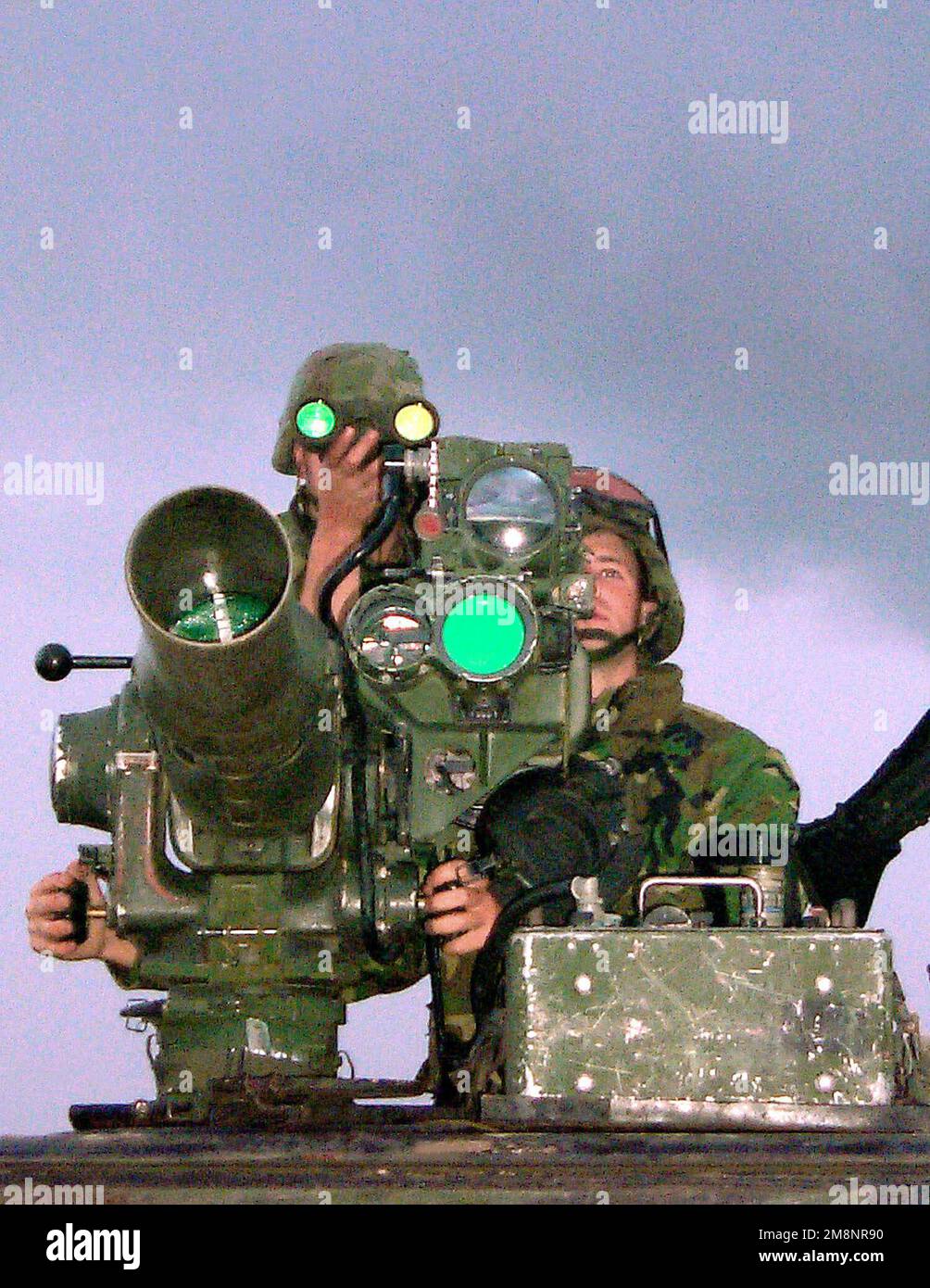 Corporal Matthew J. Pozorski and another unidentified Marine from the ...